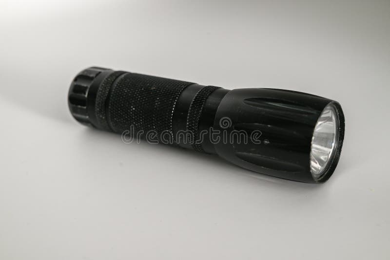 A Well Used Small but Powerful Flashlight or Electric Torch Stock Photo ...