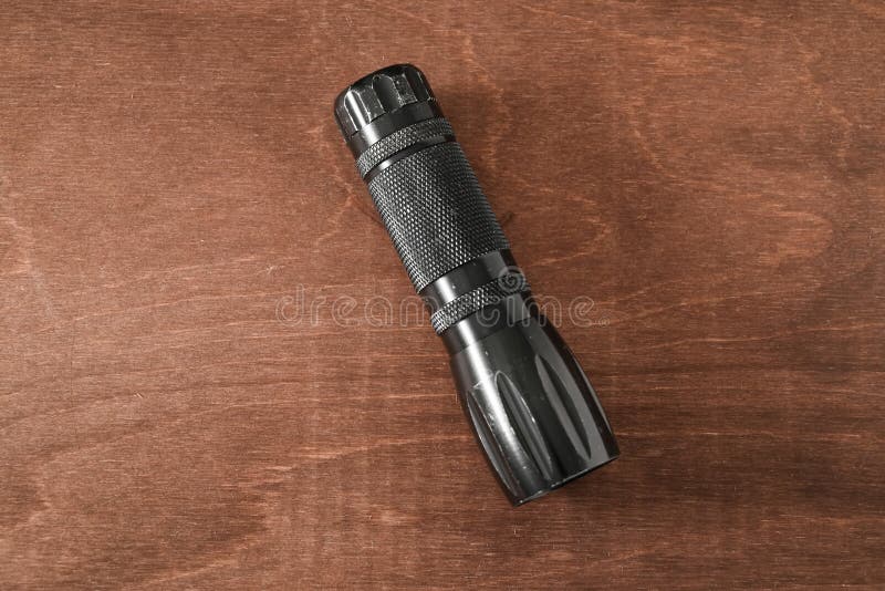 A Well Used Small but Powerful Flashlight or Electric Torch Stock Photo ...
