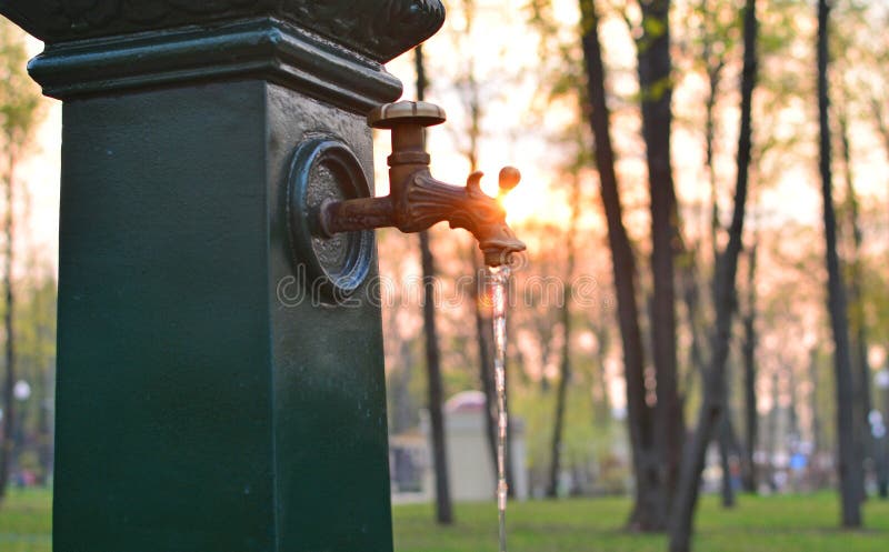 Well with Water in a Park. Water Tap Stock Photo - Image of rill ...