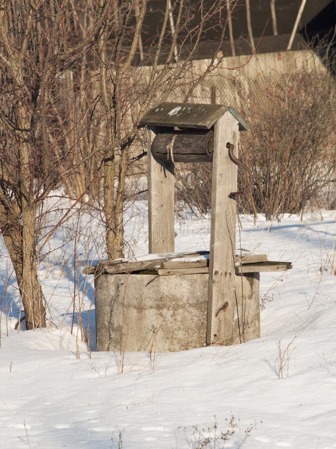 Well in winter stock photo. Image of kopanka, drinking - 115164044