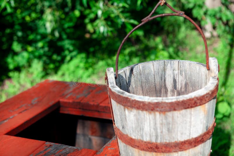 Wooden bucket for water stock image. Image of country - 225328289