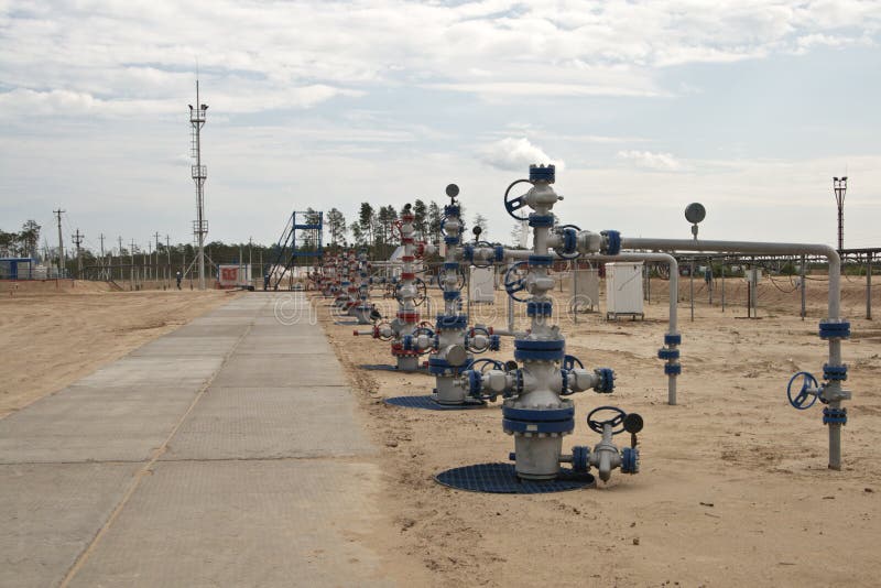 Wells for Extraction of Hydrocarbons Stock Image - Image of land ...