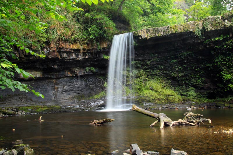 Lady at a Waterfall stock image. Image of aqua, flowing - 223644949