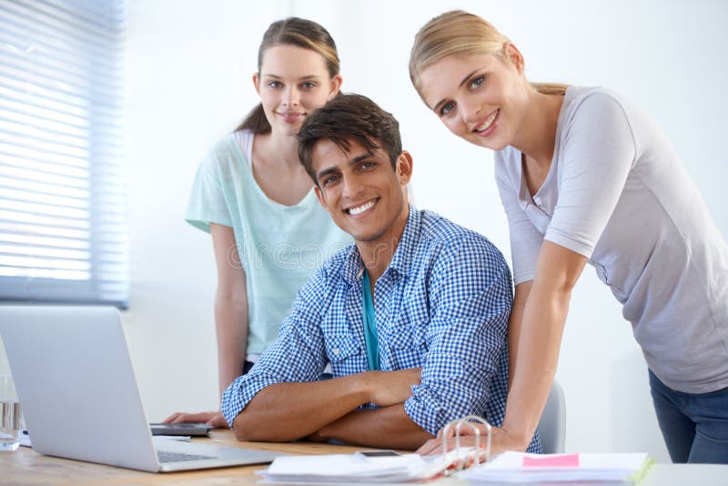 Were a Great Team. Three Colleagues Working in an Office. Stock Photo ...