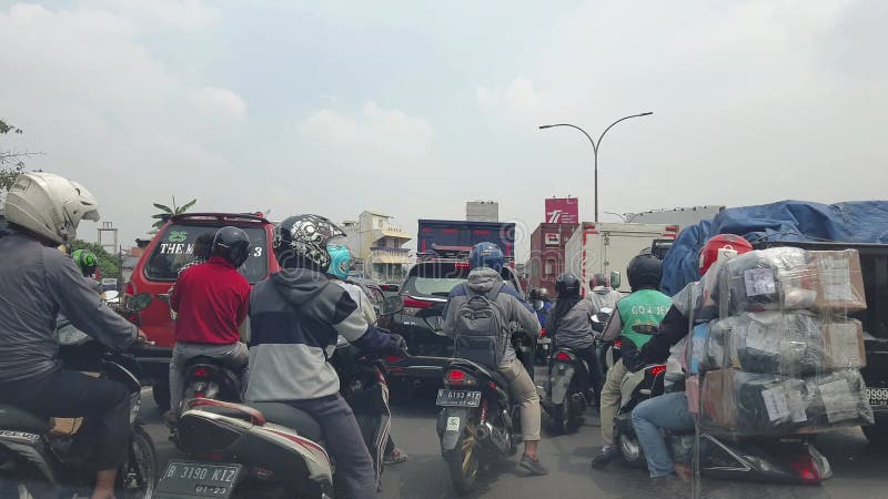 West Java, Indonesia in July 2022. Conditions at a Traffic Light Stop ...