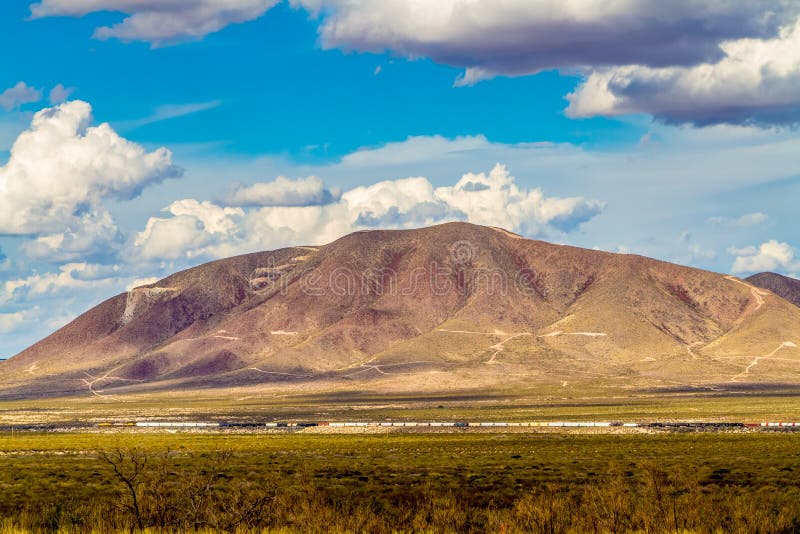 West Texas Mountains, with a Train, Clouds and Blue Sky. Stock Image ...