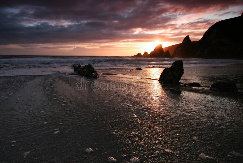 Westcombe Beach South Hams at Stock Photo - Image of foam, setting ...