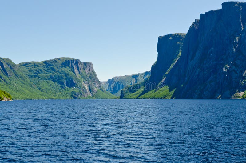 Western Brook Pond stock photo. Image of cliffs, pond - 262558976