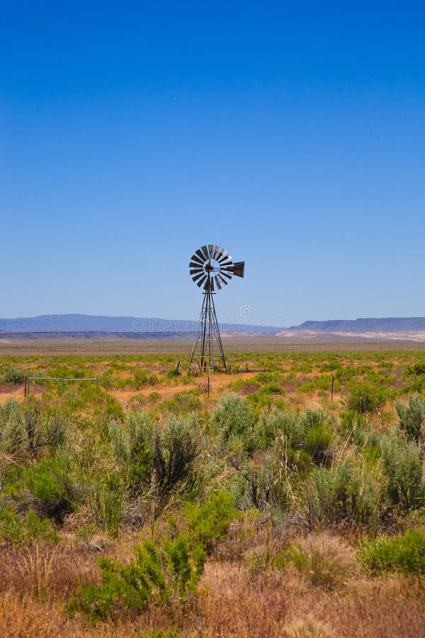 Western Scene with Old Windmill Stock Image - Image of power, cowboys ...