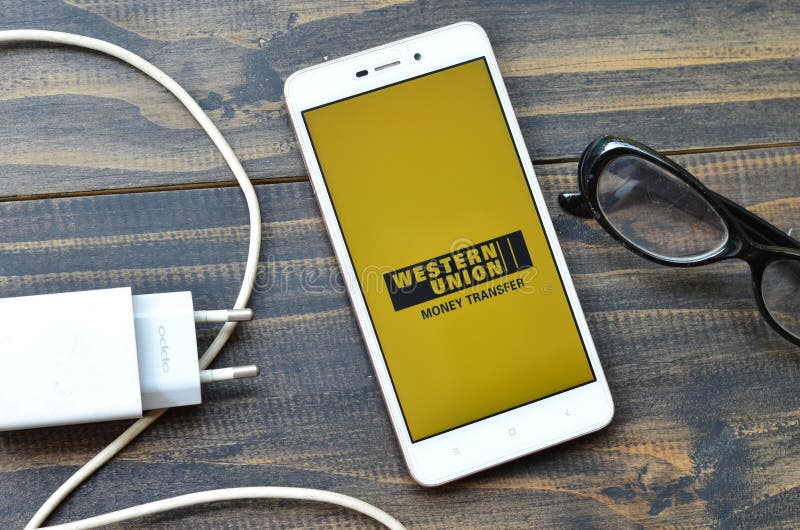 Western Union on Smartphone, Popular Payment Methode in the World Wide ...