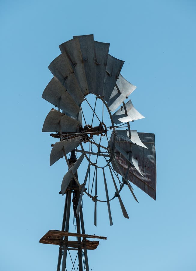 Classic Western Ranch Windmill Stock Image - Image of country, green ...