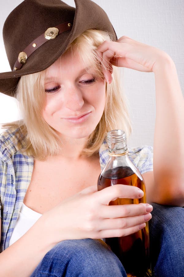Western woman stock photo. Image of female, cowboy, bottle - 16665660