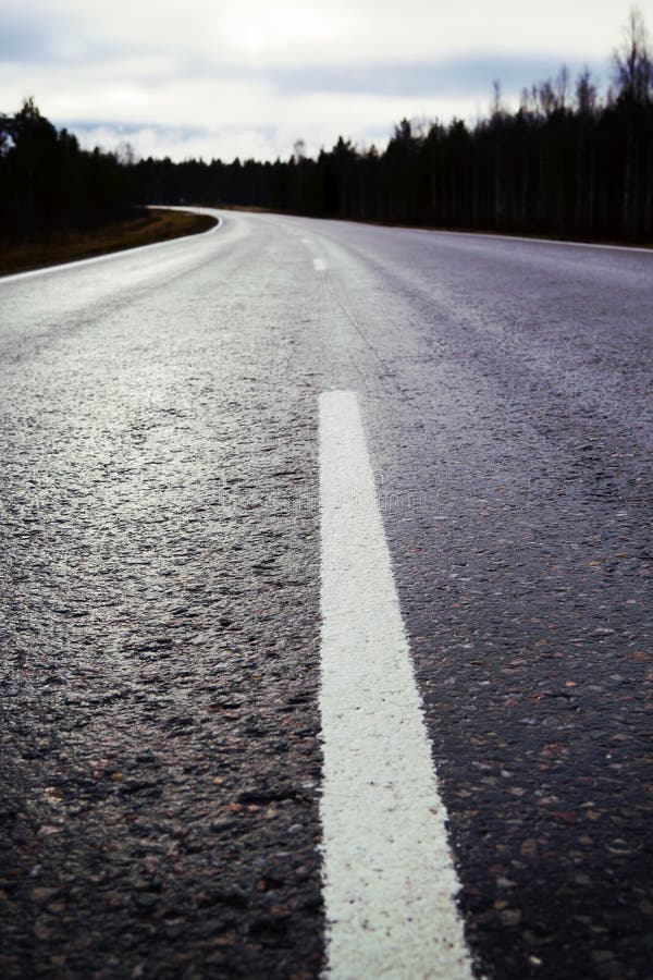A Road Curving To the Left and Revealing an Epic Mountain and Prairie ...