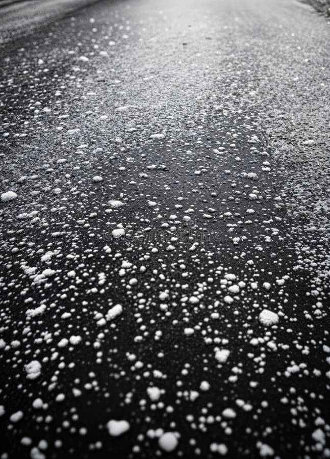 Embeded Stone on the Asphalt Road in Rain, Closeup of Photo. Rainy Road ...