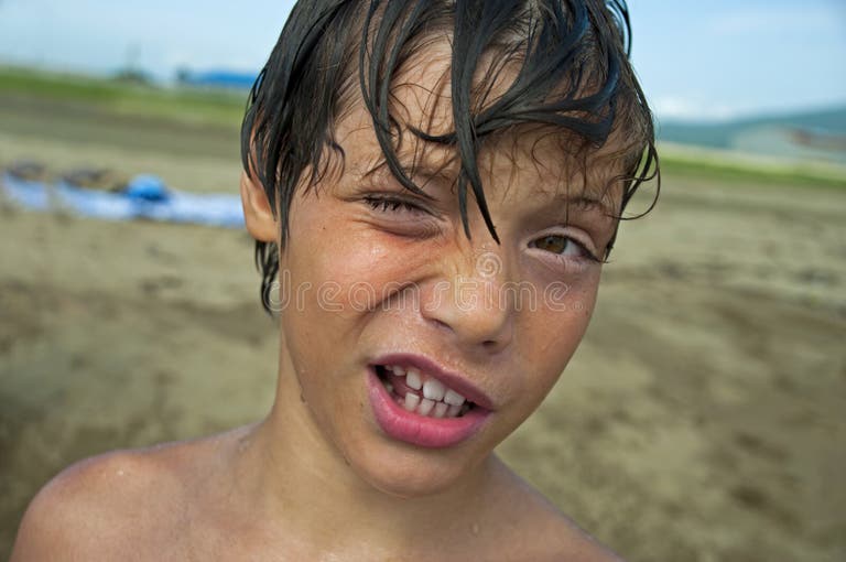 The wet boy stock image. Image of hair, beach, closed - 15523639