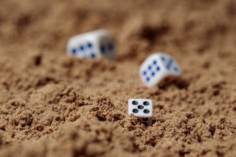 In Wet Brown Sand the Dice are Three Pieces Stock Photo - Image of ...