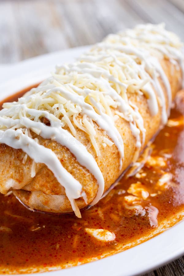 Wet burrito plate stock photo. Image of sauce, restaurant - 192733532