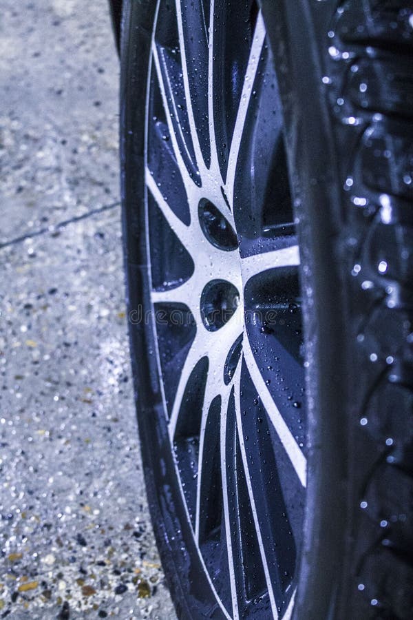 Wet Car Wheel stock image. Image of background, tire - 136445585
