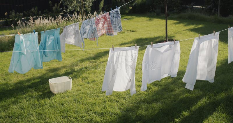 Wet Clothes Drying in the Backyard of the House. Top View Stock Footage ...