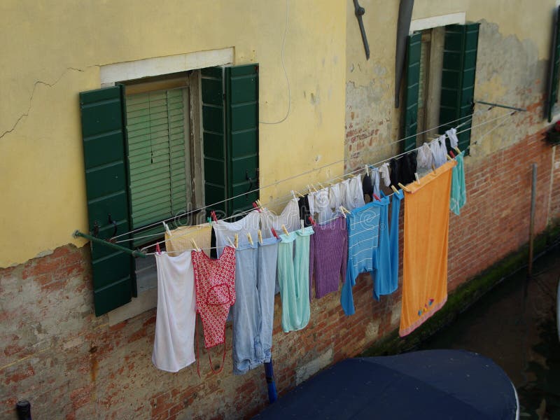 Wet Clothes Hanging Near Canal Stock Photo - Image of clean, home: 5412098