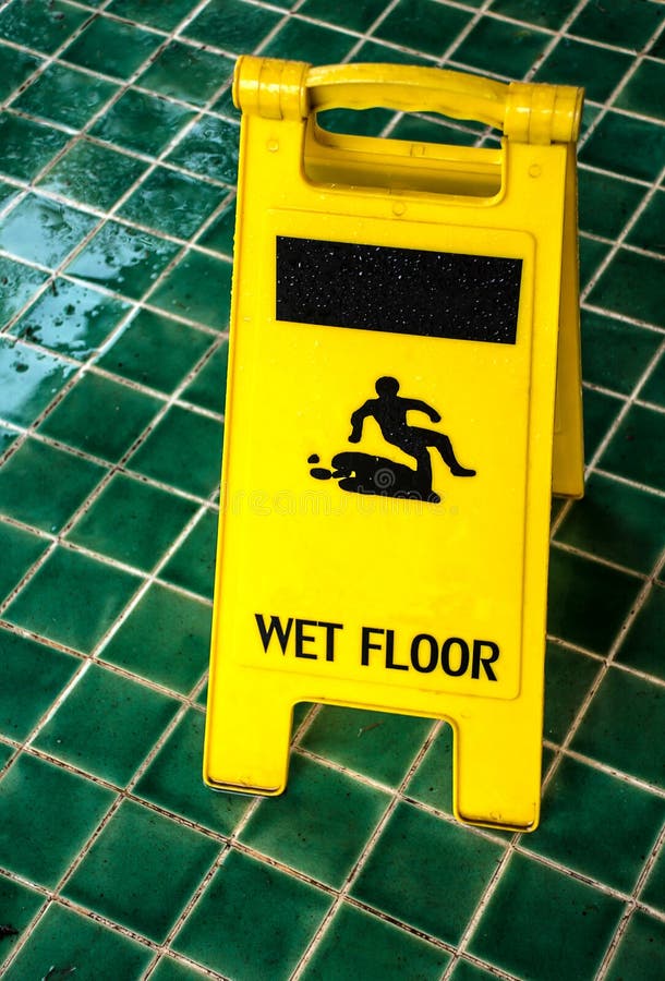 Wet floor caution sign stock image. Image of sign, tiles - 61227559
