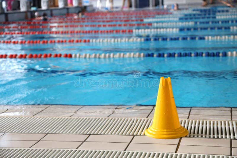 Wet Floor Cone Signal in the Indoor Pool Stock Photo - Image of indoor ...