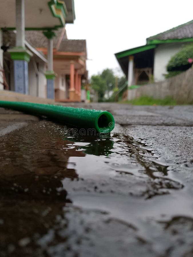 Wet Ground after the Rain is Awesome Stock Image - Image of pipe, rain ...