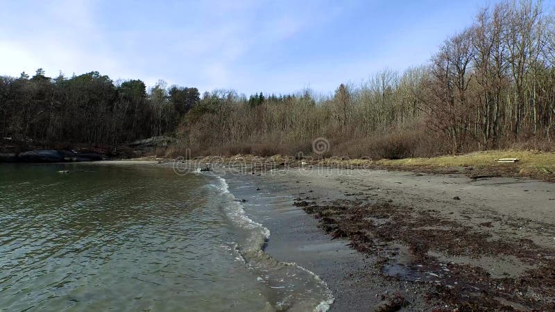 Wet and messy beach stock footage. Video of spring, norway - 70573236