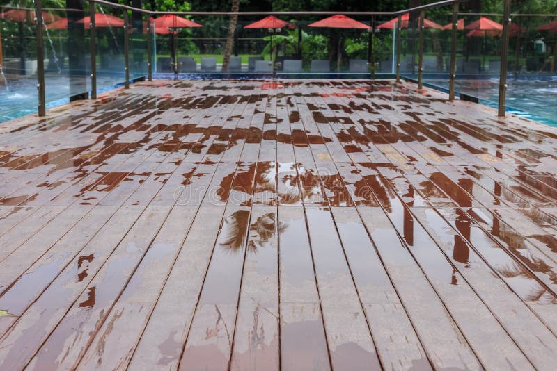 Wet Outdoor Decking beside Swimming Pool after Raining Stock Photo ...