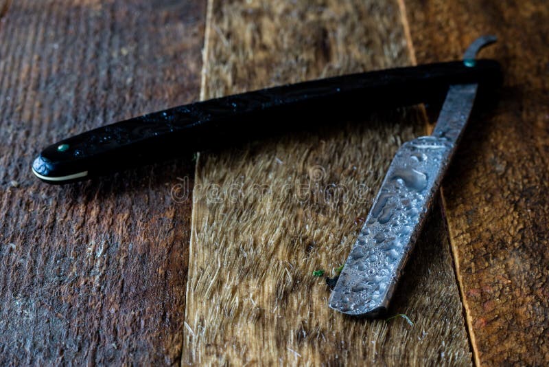 Wet Razor on a Wooden Table Stock Photo - Image of manual, accessory ...