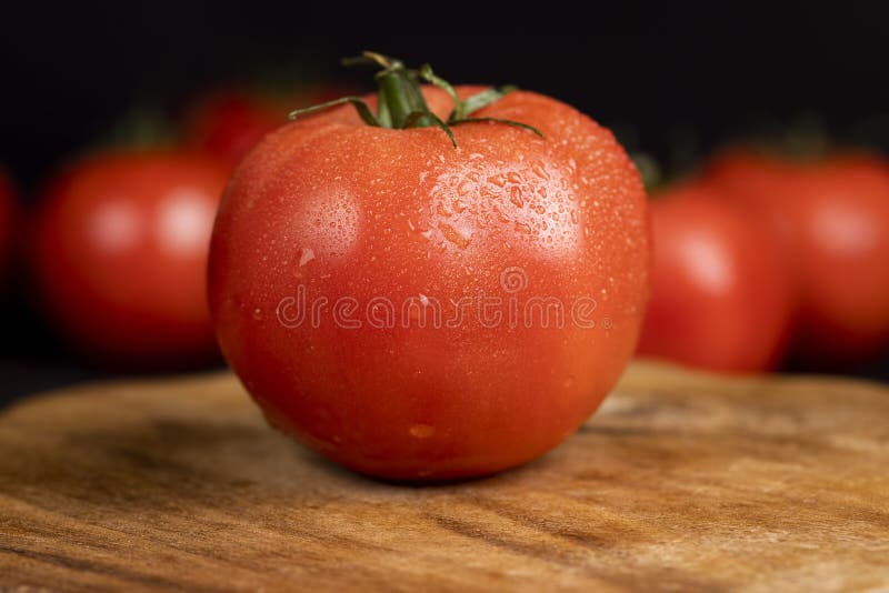Wet Ripe Red Tomatoes on the Table Stock Photo - Image of foodstuff ...