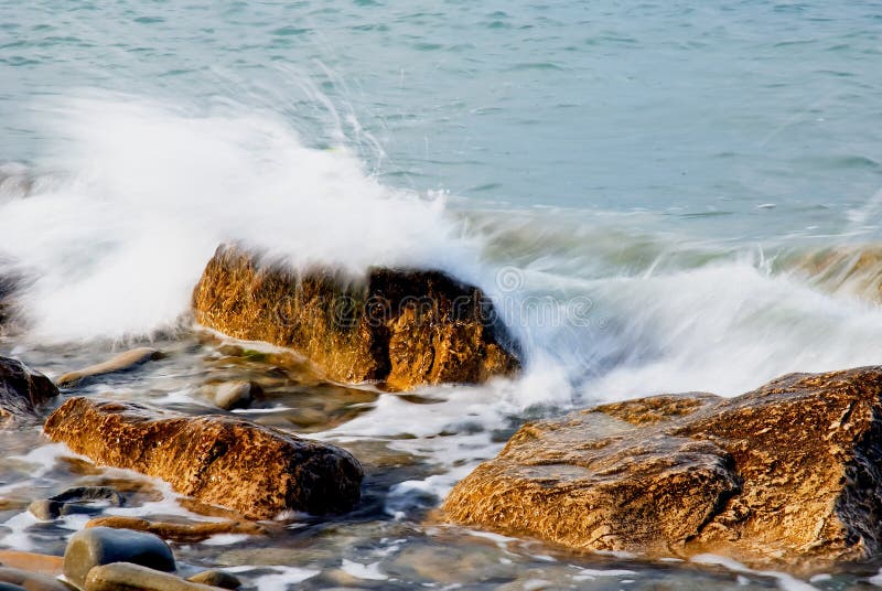 Wet rocks stock photo. Image of water, coast, blue, beach - 16545396