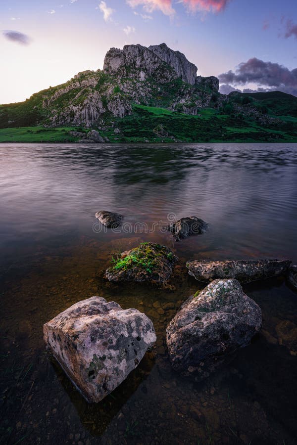 WET ROCKS in the LAKE in Lagos De Covadonga, Asturias, Spain Stock ...