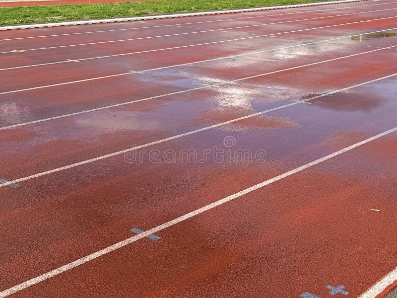 Wet running track stock photo. Image of running, illustrative - 286984740
