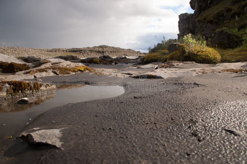 Wet sand with rocks stock photo. Image of structure, outdoor - 45798740