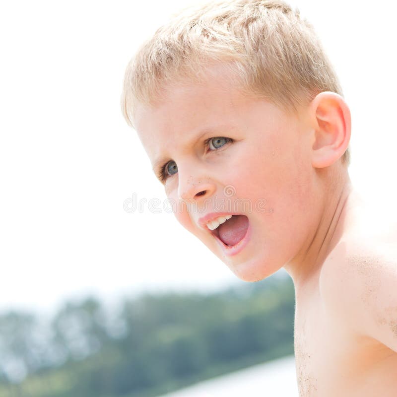 Wet Sandy Boy at the Lake stock image. Image of young - 26812423