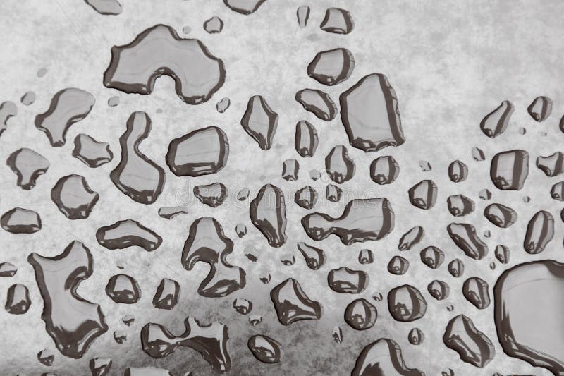A Wet Surface with Many Small Drops of Water Scattered Across it Stock Photo - Image of sizes ...