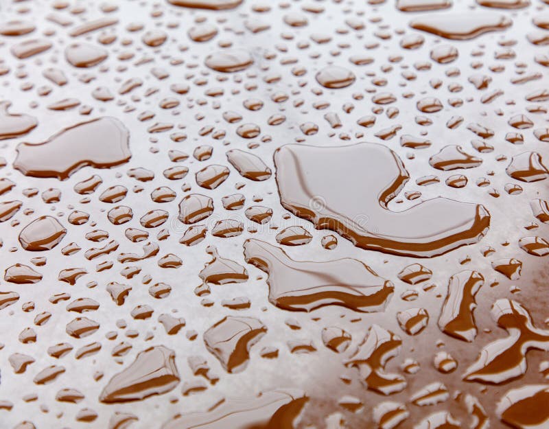 A Wet Surface with Many Small Water Droplets Scattered Across it Stock ...