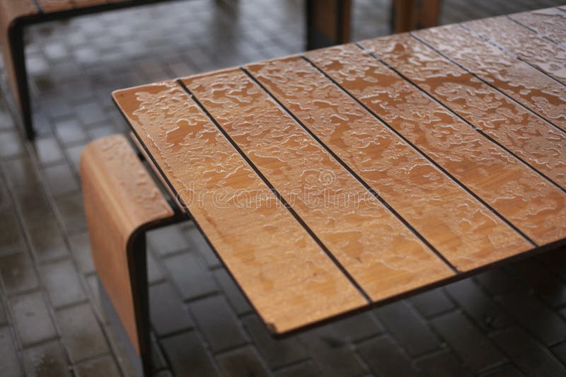 Wet table. Rain outside stock image. Image of restaurant - 283700349