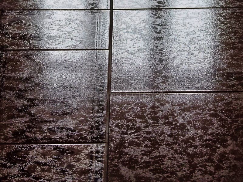 Wet Tiled Floor with Reflections and Textured Surface Pattern Stock ...