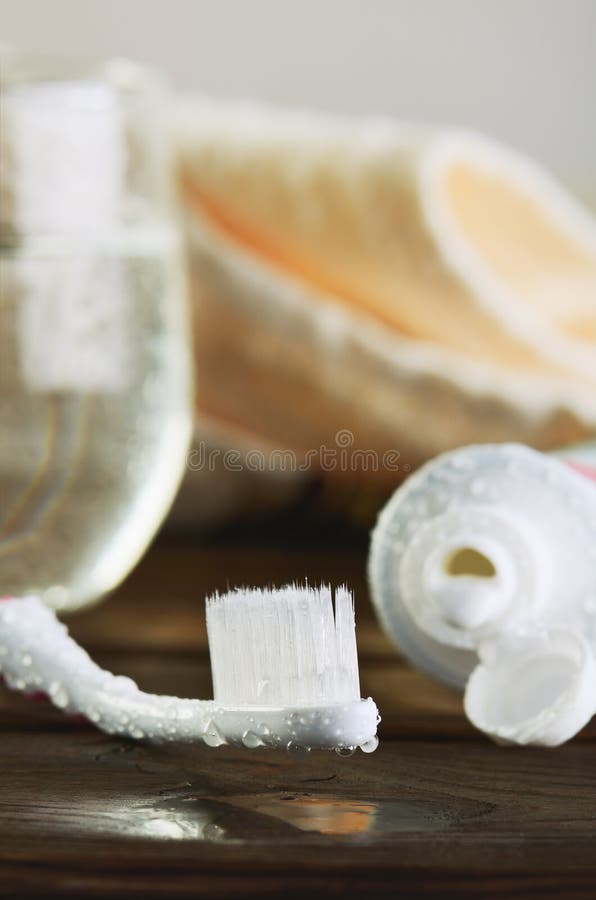 Toothbrush and Open Tube of Toothpaste on a Wooden Table Horizon Stock ...