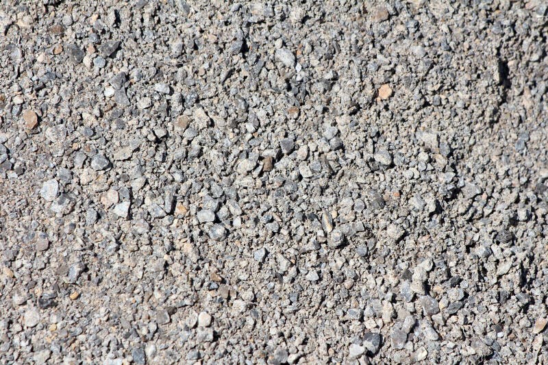 Wet Washed Out White and Grey Various Size Gravel at Local Construction ...