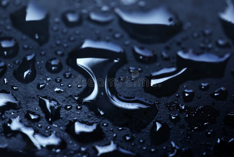 Water Drops on Black Surface Stock Image - Image of monochrome, closeup ...