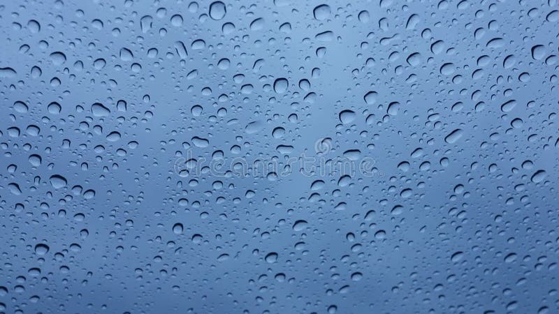 Wet Windshield, Taken from Inside the Car.Rain Falls on the Surface of ...