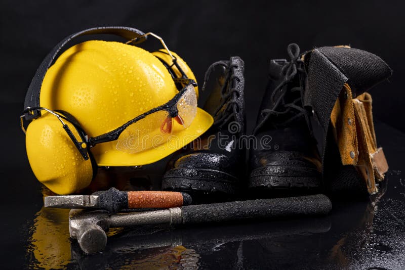 Wet Work Clothes And Tools For The Production Worker. Raindrops On The ...