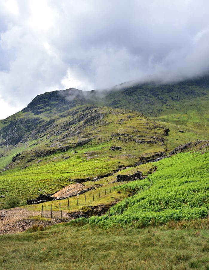 The Wetherlam Ridge Hidden by Mist Stock Image - Image of edge, slops ...