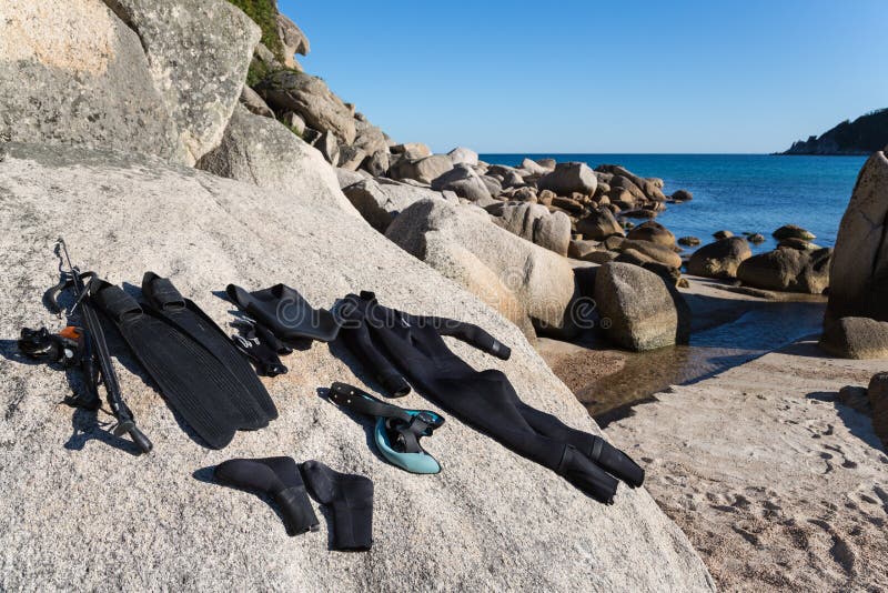 Wetsuit and a Gun for Underwater Hunting Stock Image - Image of rocky ...