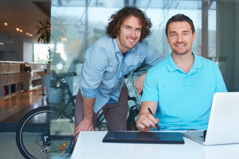 Weve Been Called the Dynamic Duo. Two Coworkers Working on a Laptop in ...