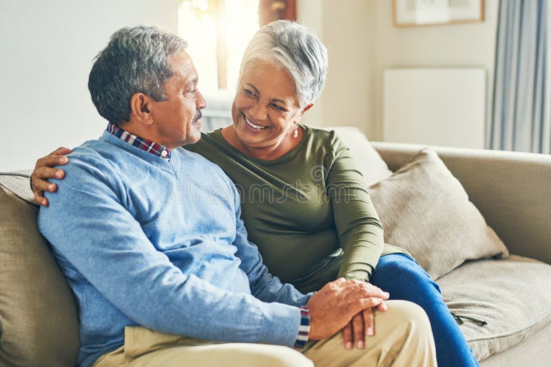 Weve Always Been Happy Together An Affectionate Senior Couple Relaxing On A Sofa Together At