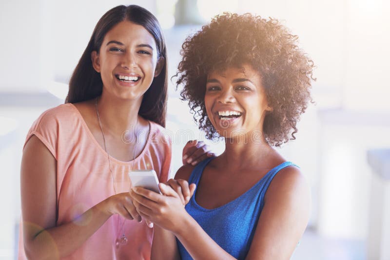 Weve Got That Bestie Connection Two Girlfriends Hanging Out Together Using A Cellphone Stock